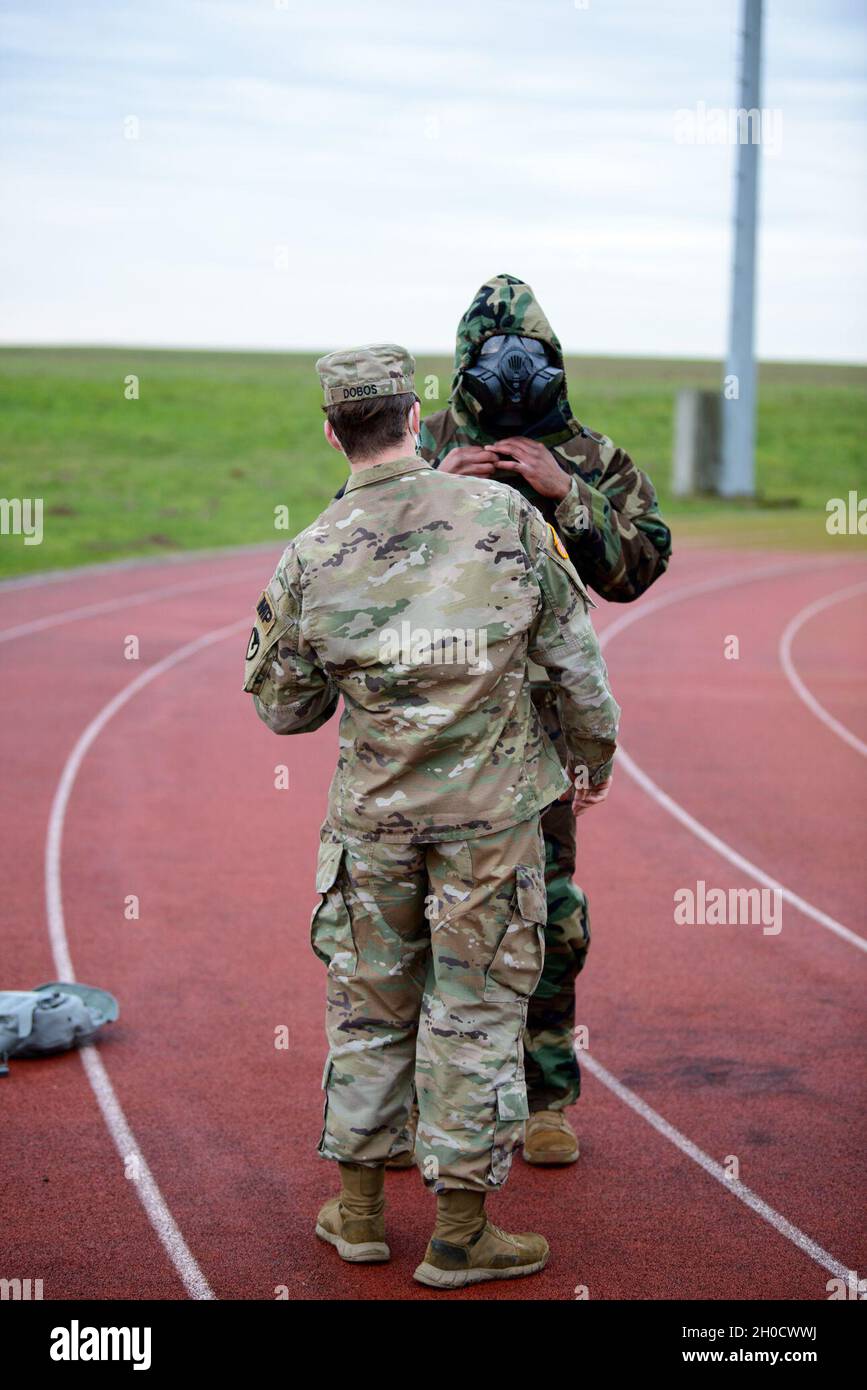 U.S. Army U.S. Army Staff Sgt. Andrew Dobos, checks the seal of the ...