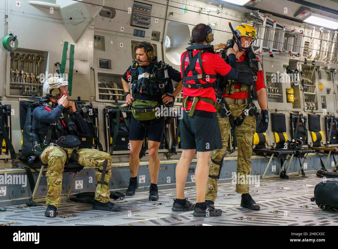 (From left) Staff Sgt. Jared Isaacson, Maj. Brock Roden, Tech. Sgt. Dan ...