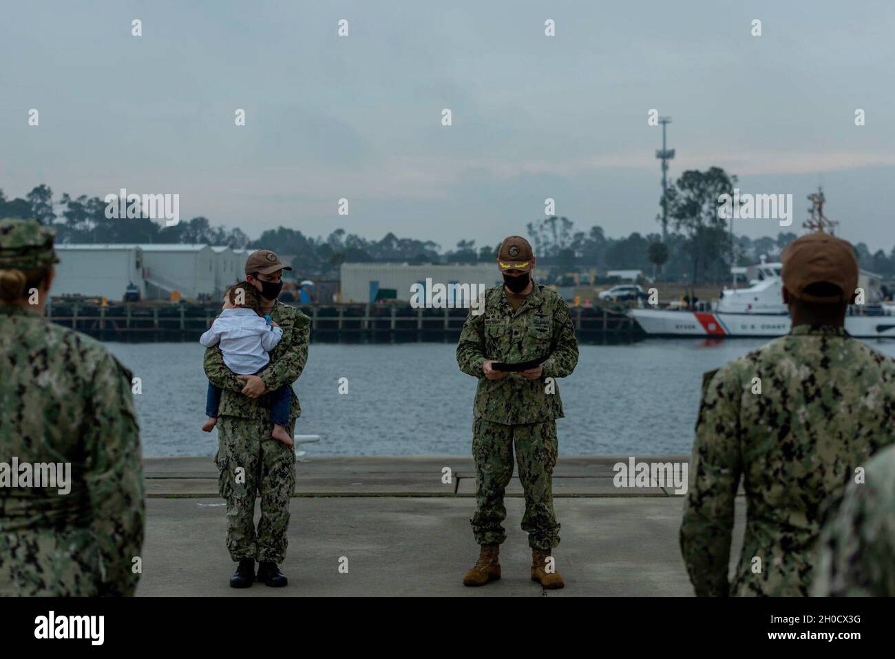 While on father duties, Operations Specialist 2nd Class Jack ...