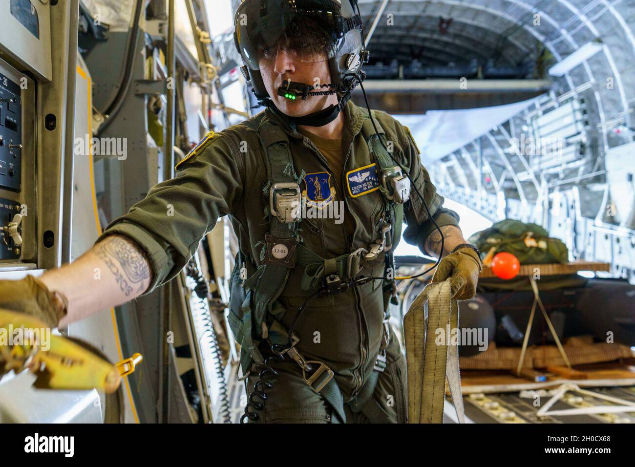 Master Sgt. Colton Nelson, a loadmaster with the 144th Airlift Squadron ...