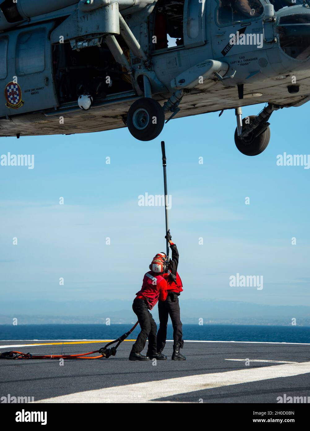 210127-N-SS900-1098 PACIFIC OCEAN (Jan. 27, 2021) Aviation Ordnanceman ...