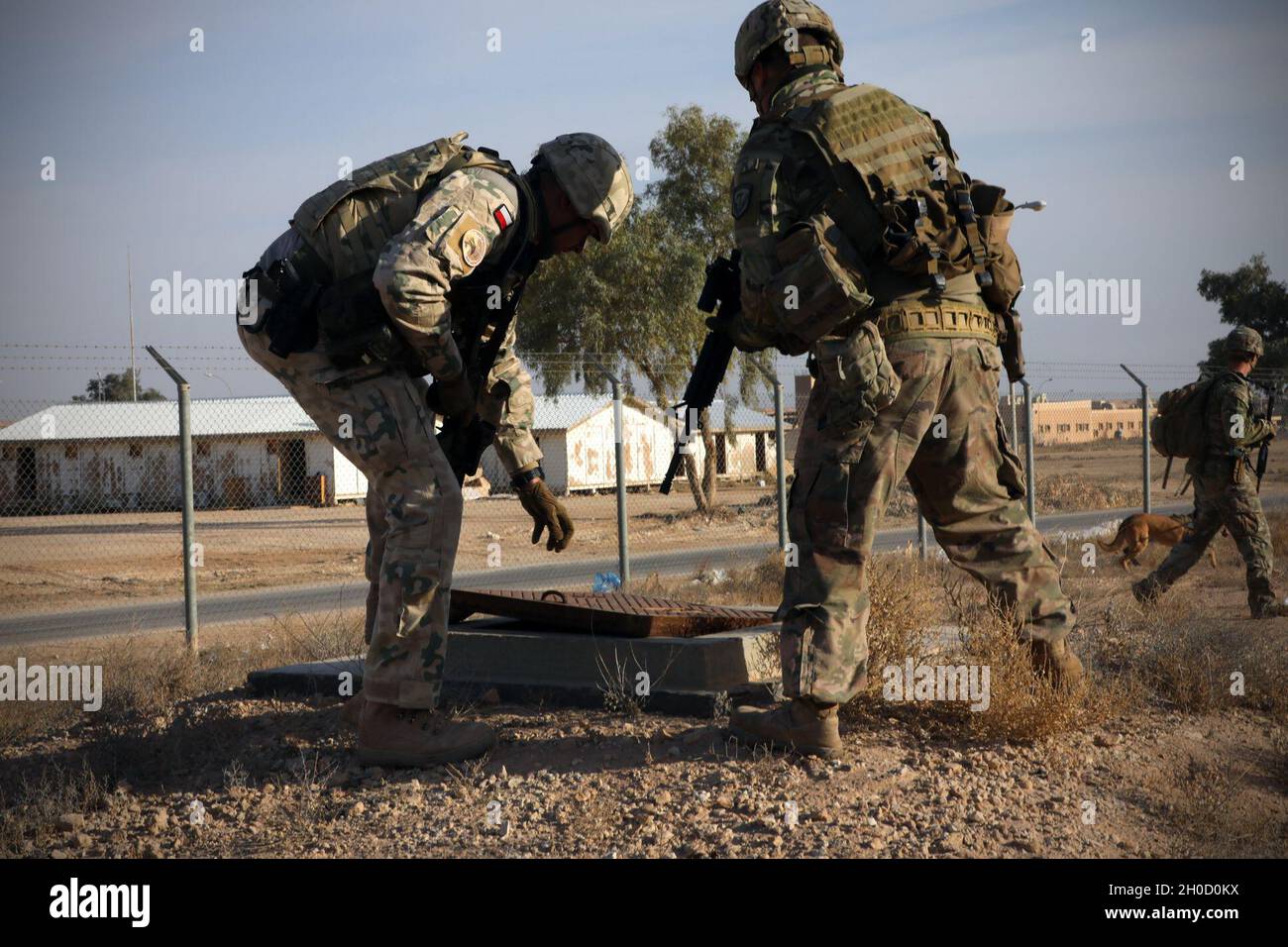 Polish engineer soldiers from Task Force Minecraft and a U.S. Military ...