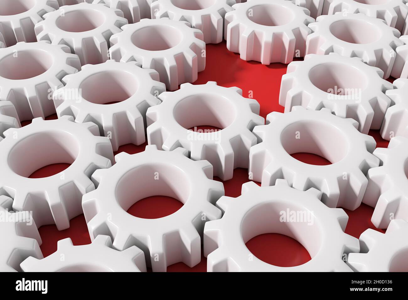 Many white connecting gear cogs working together isolated on red ...