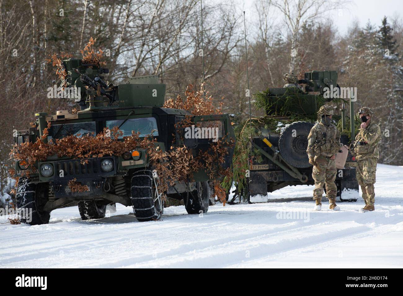 U.S. Army Soldiers assigned to 1st Squadron, 91st Cavalry Regiment talk ...