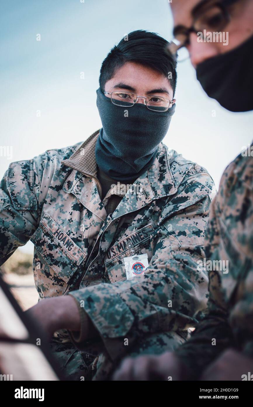 U.S. Marine Corps Christopher Hoang, a satellite operator with the 11th ...