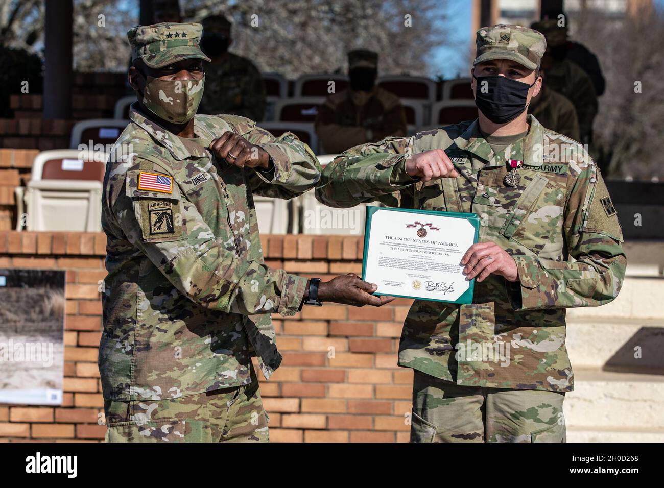 U.S. Army Sgt. Tyrel Trainor of the 4th Infantry Division, is awarded ...