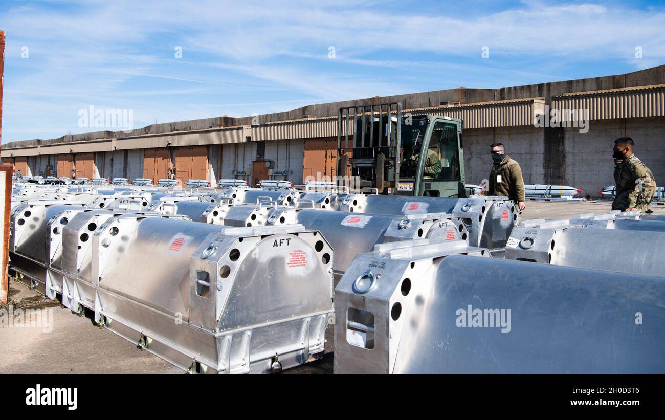 Airmen from the 2nd Munitions Squadron lay out AGM-158 Joint Air-to ...