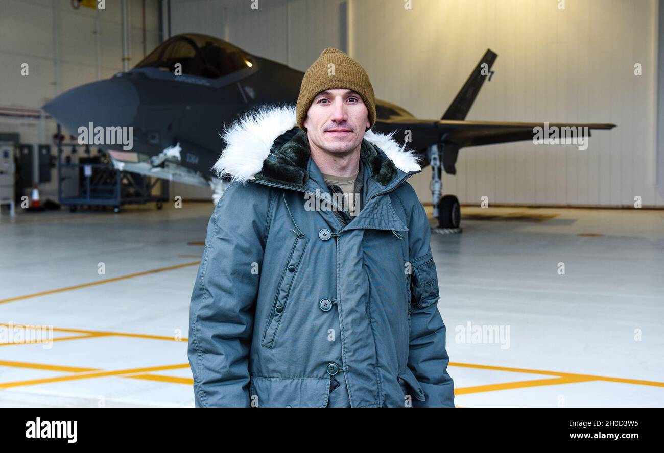Lt. Col. James Christensen, 356th Fighter Squadron commander, stands in ...