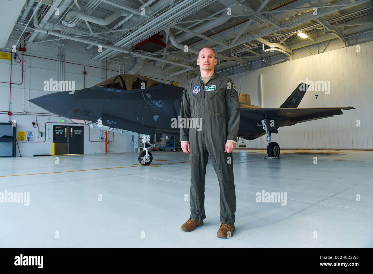 Lt. Col. James Christensen, 356th Fighter Squadron commander, stands in ...