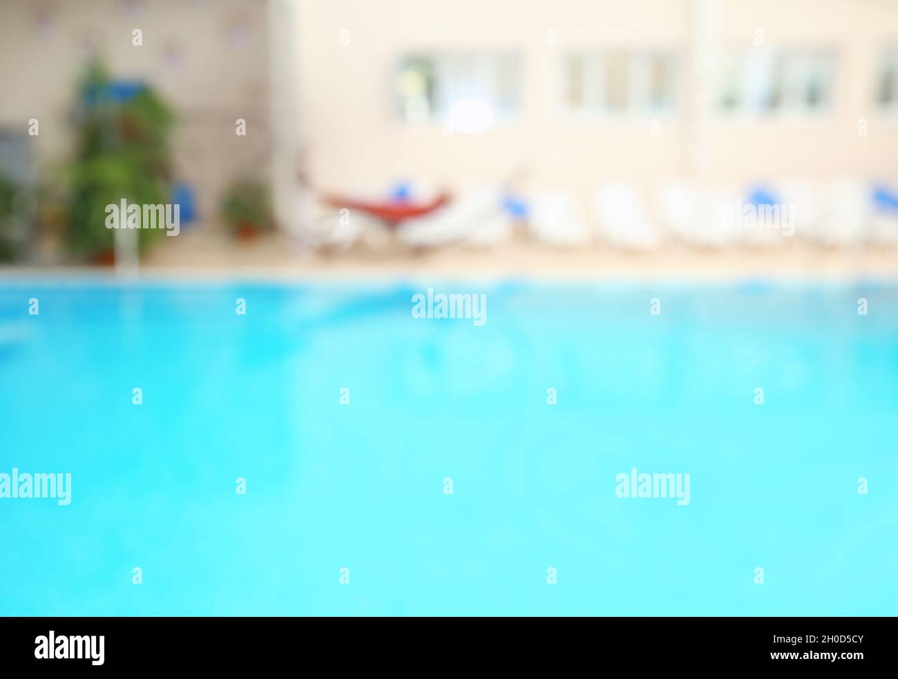 Blurred background of swimming pool with clear blue water Stock Photo ...