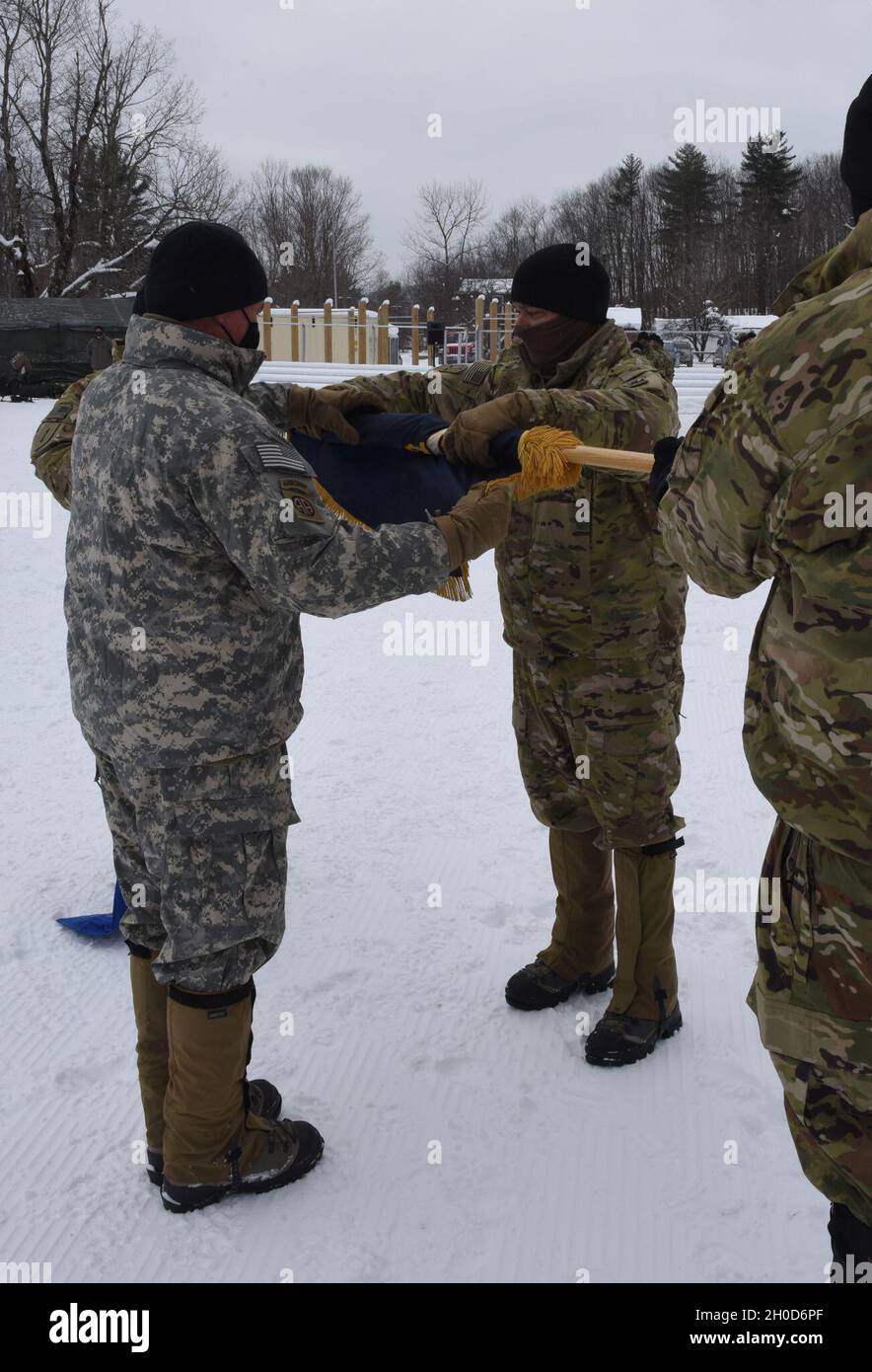 Col. Brey Hopkins (left) and Lt. Col. Matthew Wignall case the colors ...