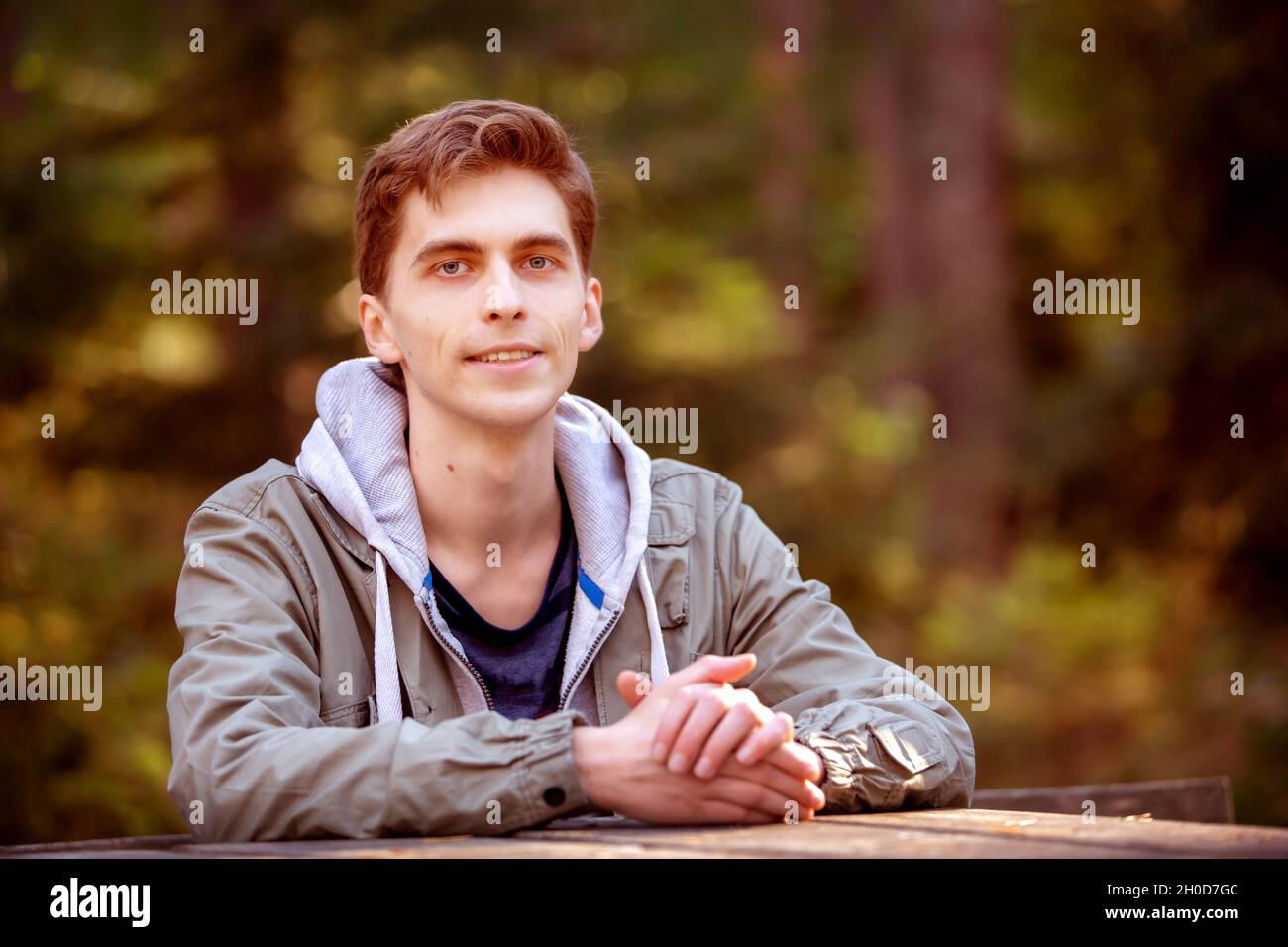 Handsome attentive young man hi-res stock photography and images - Alamy