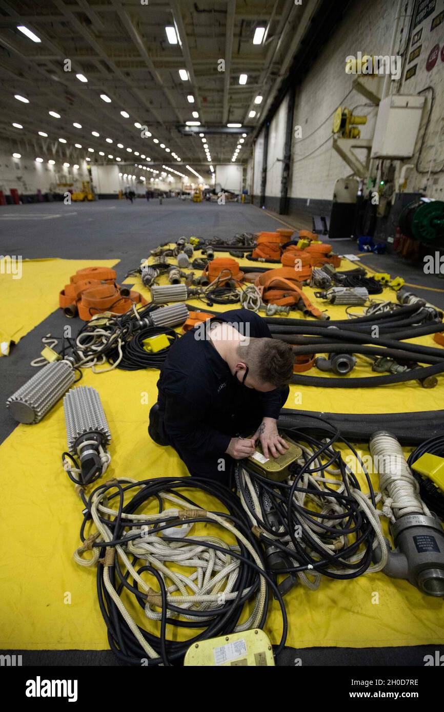 Electrician's Mate Fireman Aaron Iverson, from Chicago, assigned to USS ...
