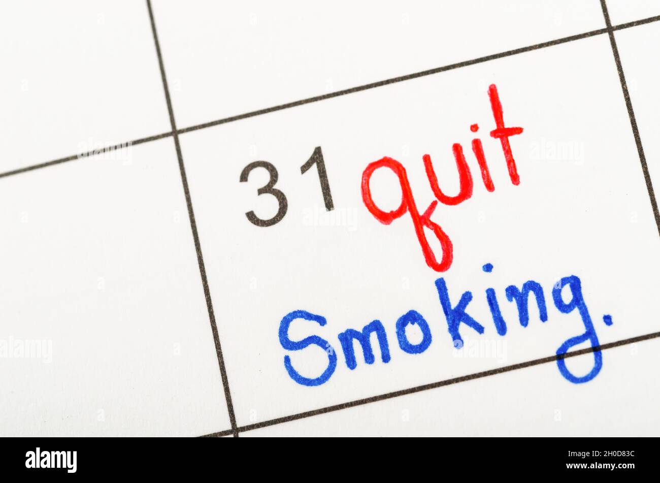 The words Quit Smoking written in calendar to remind you an important ...