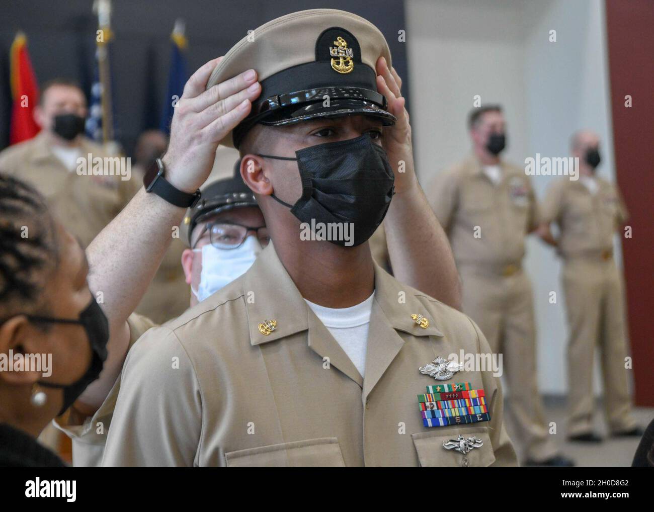 Newly-pinned HMC Roderick Hunter at the Chief's Pinning ceremony aboard ...
