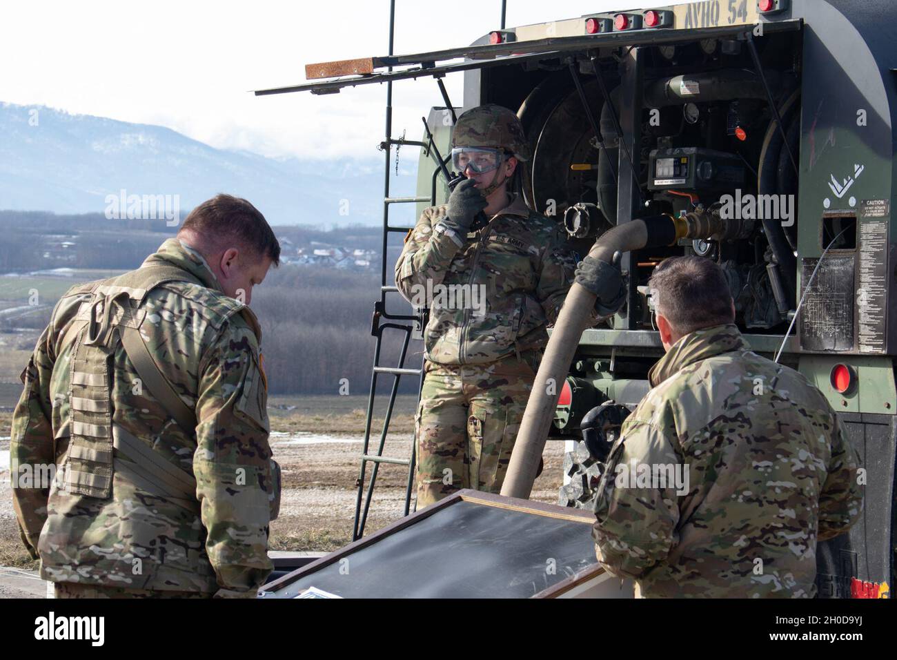 U.S. Soldiers assigned to Regional Command-East, Kosovo Force, initiate ...