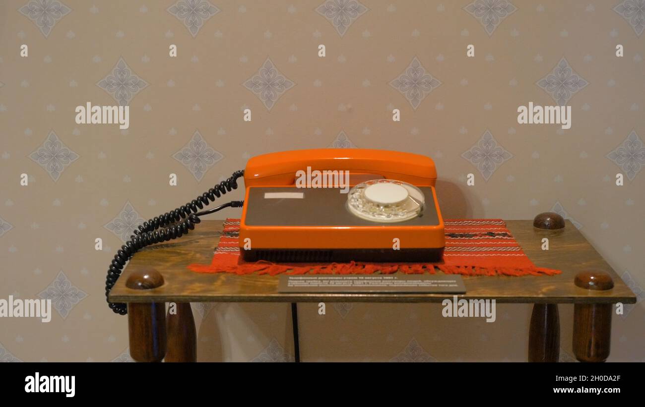 Old Soviet orange disk phone. Od phone in the Museum of history Stock ...