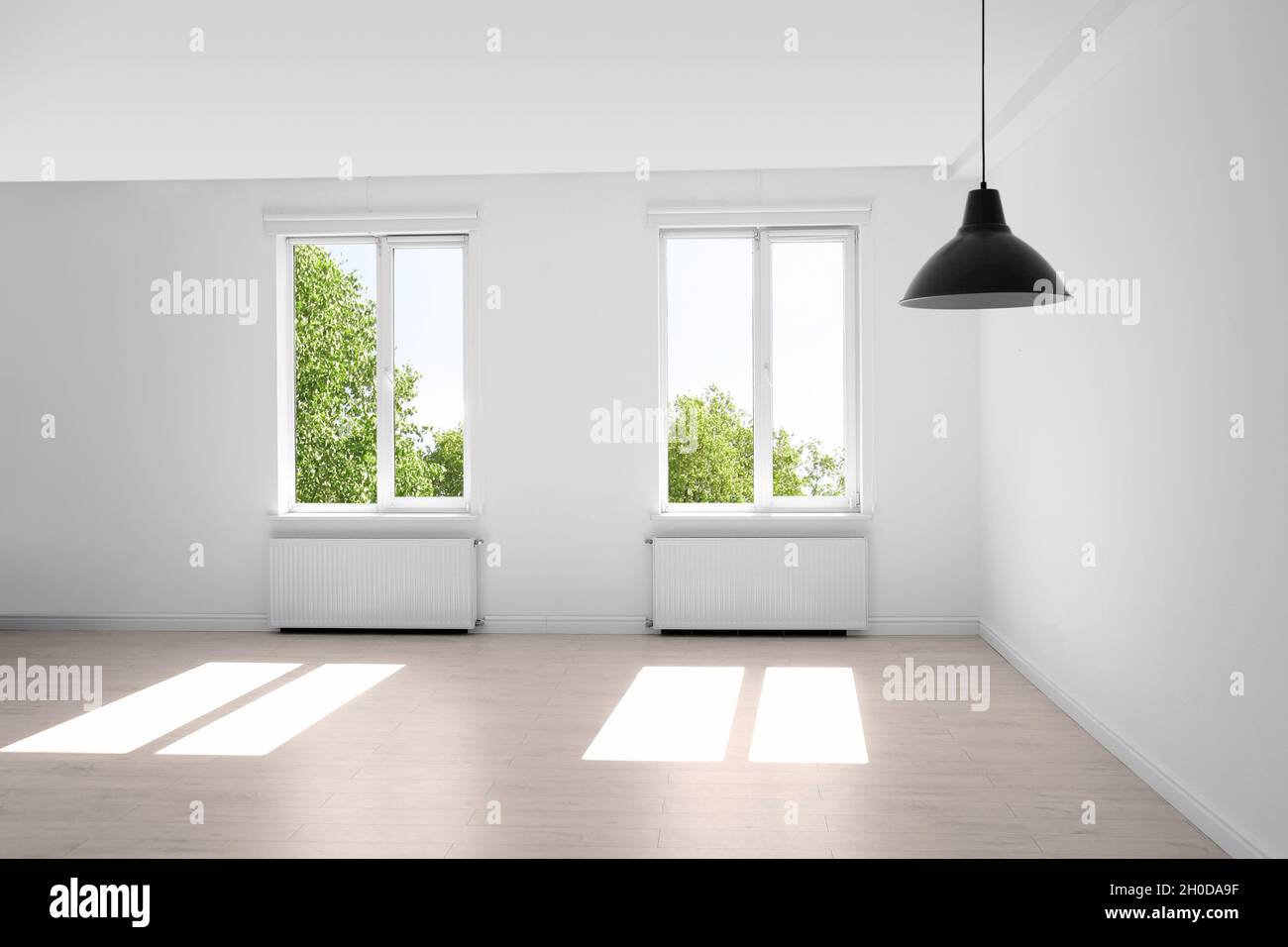 Empty living room with windows. Interior design Stock Photo - Alamy