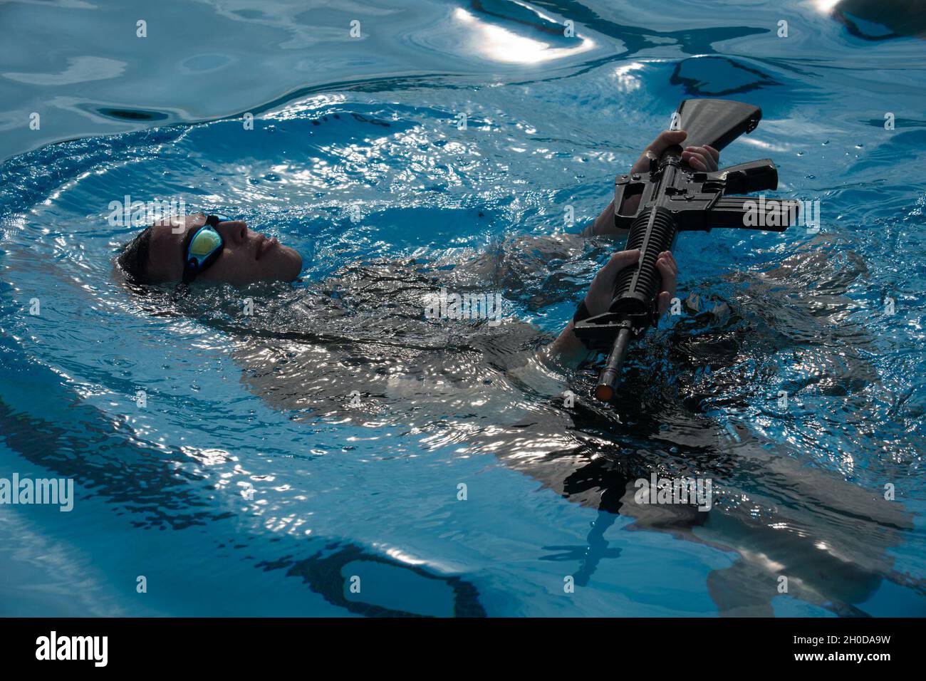 A U.S. Marine with 1st Radio Battalion, I Marine Expeditionary Force ...