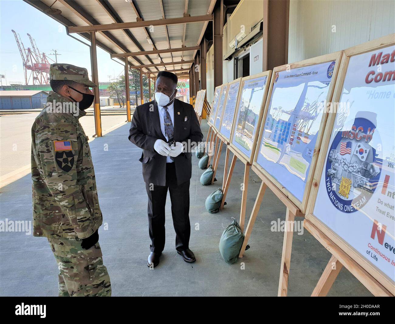 Michael A. King, director, Busan Storage Center, briefs Col. Wheeler R ...