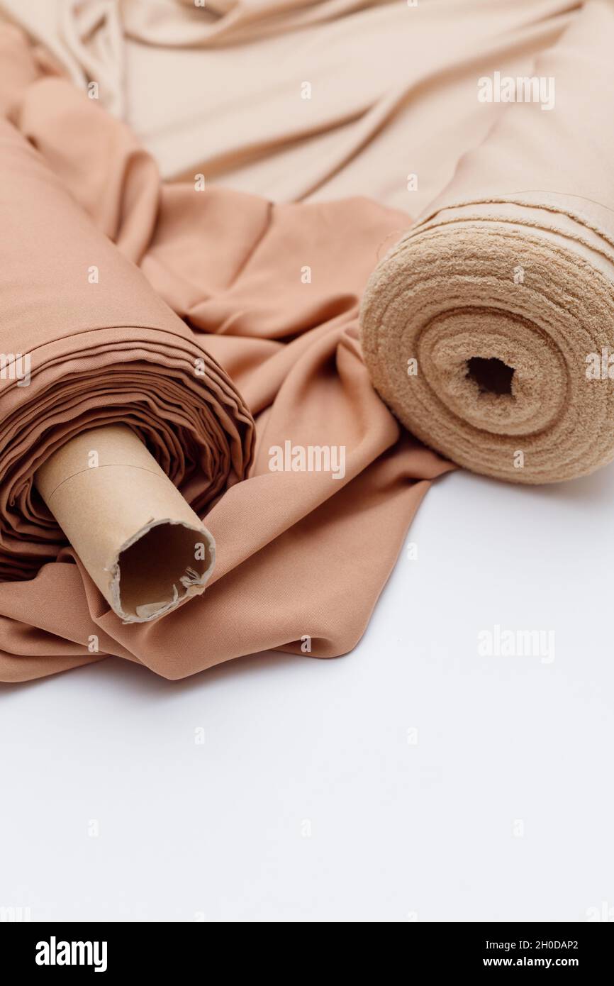 Rolls of pastel color fabric isolated on white, Synthetic and natural ...