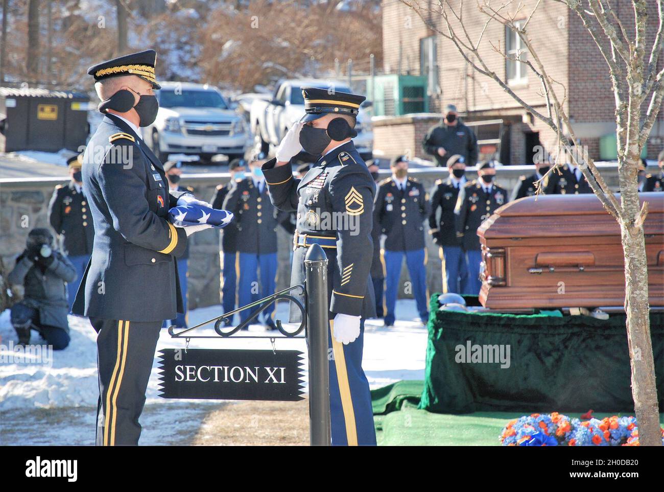 New York Army National Guard Brig. Gen. Jack James receives the casket ...