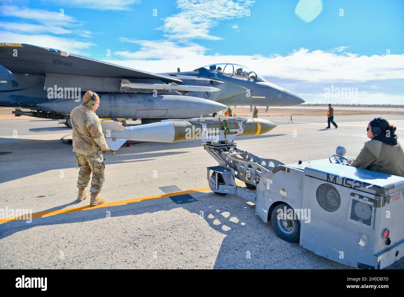 Servicemembers of the 332 Air Expeditionary Wing maintenance load ...