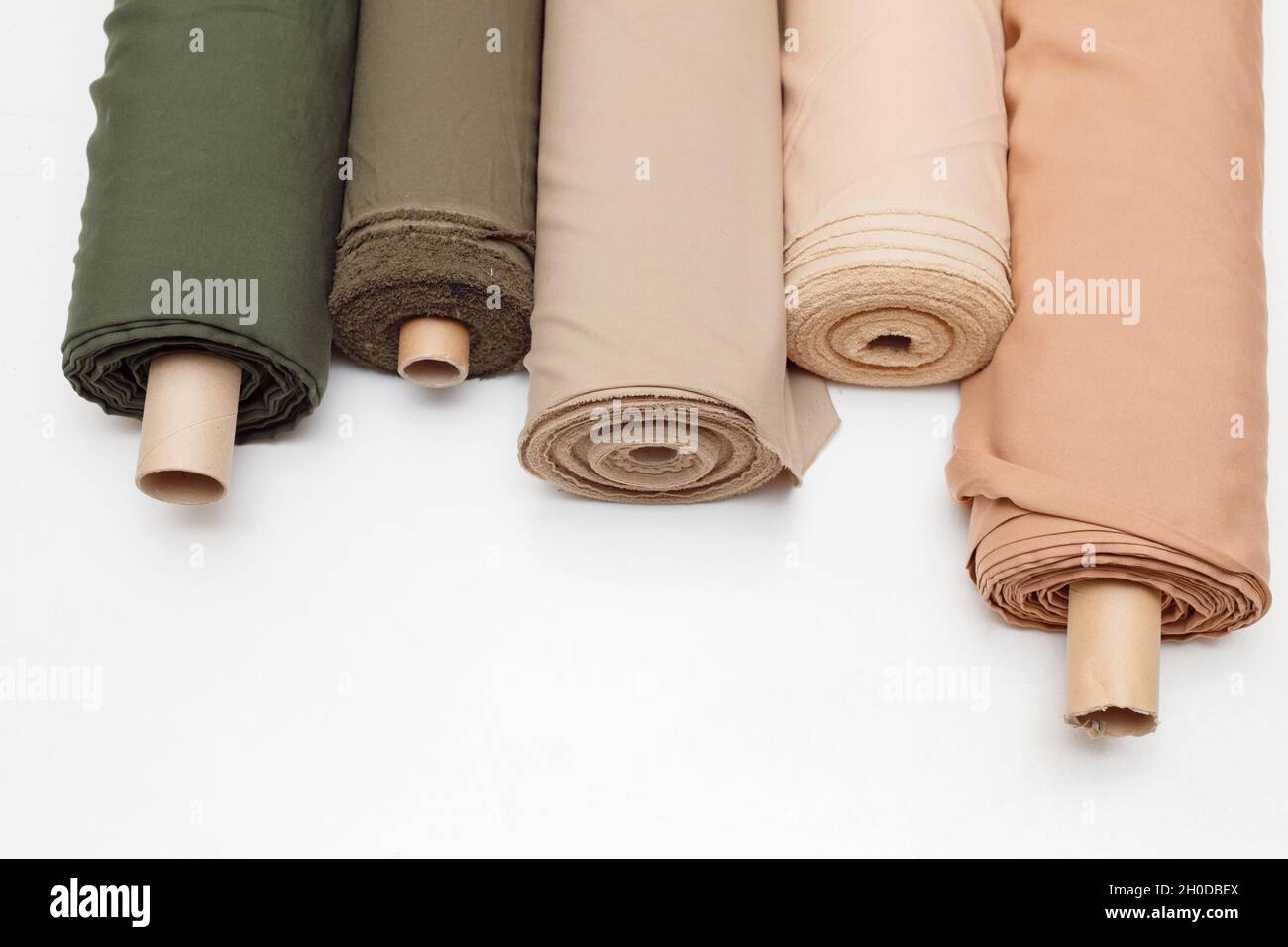 pastel color fabric rolls isolated on white, Synthetic and natural ...