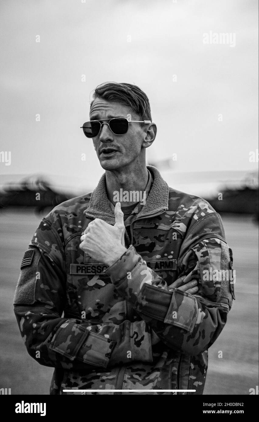 Sgt. Thomas Presson gives an interview during cold load training for ...