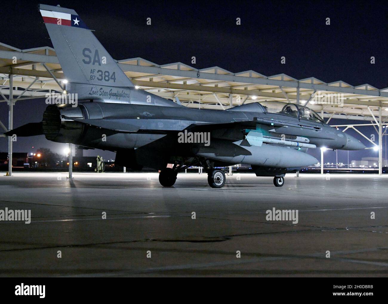 An Air National Guard F-16 Fighting Falcon taxis off the 149th Fighter ...