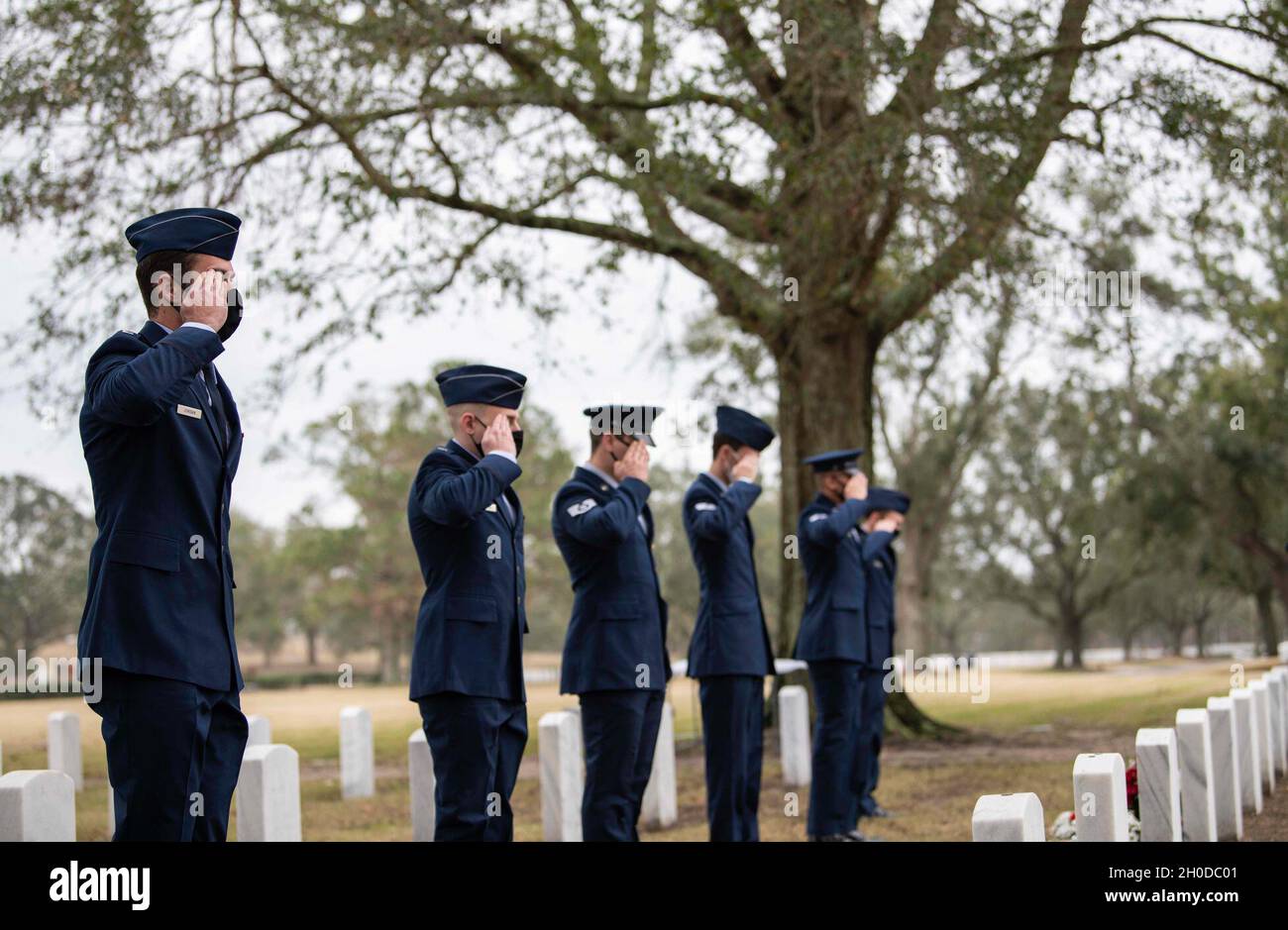 Air Commandos salute fallen service members during a memorial ceremony ...