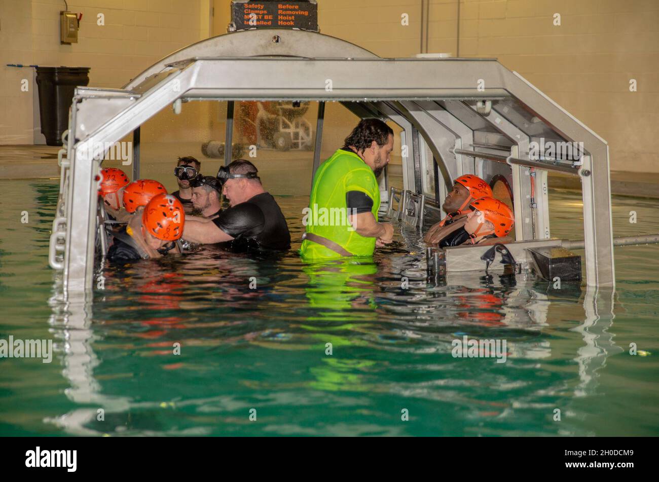 U.S. Marines prepare to escape the Modular Amphibious Egress Trainer ...