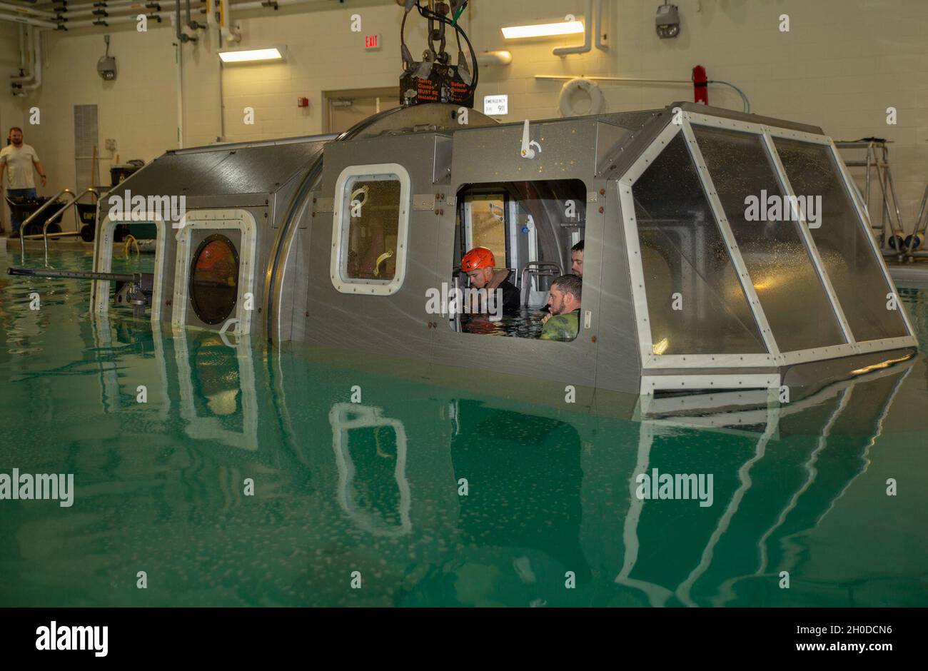 U.S. Marines prepare to escape the Modular Amphibious Egress Trainer ...