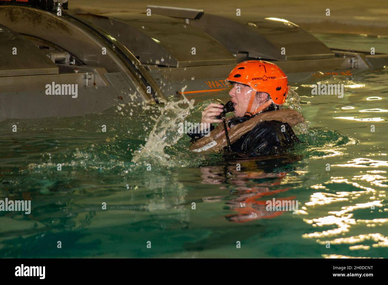 A U.S. Marines comes up to take a breath after escaping the Modular ...