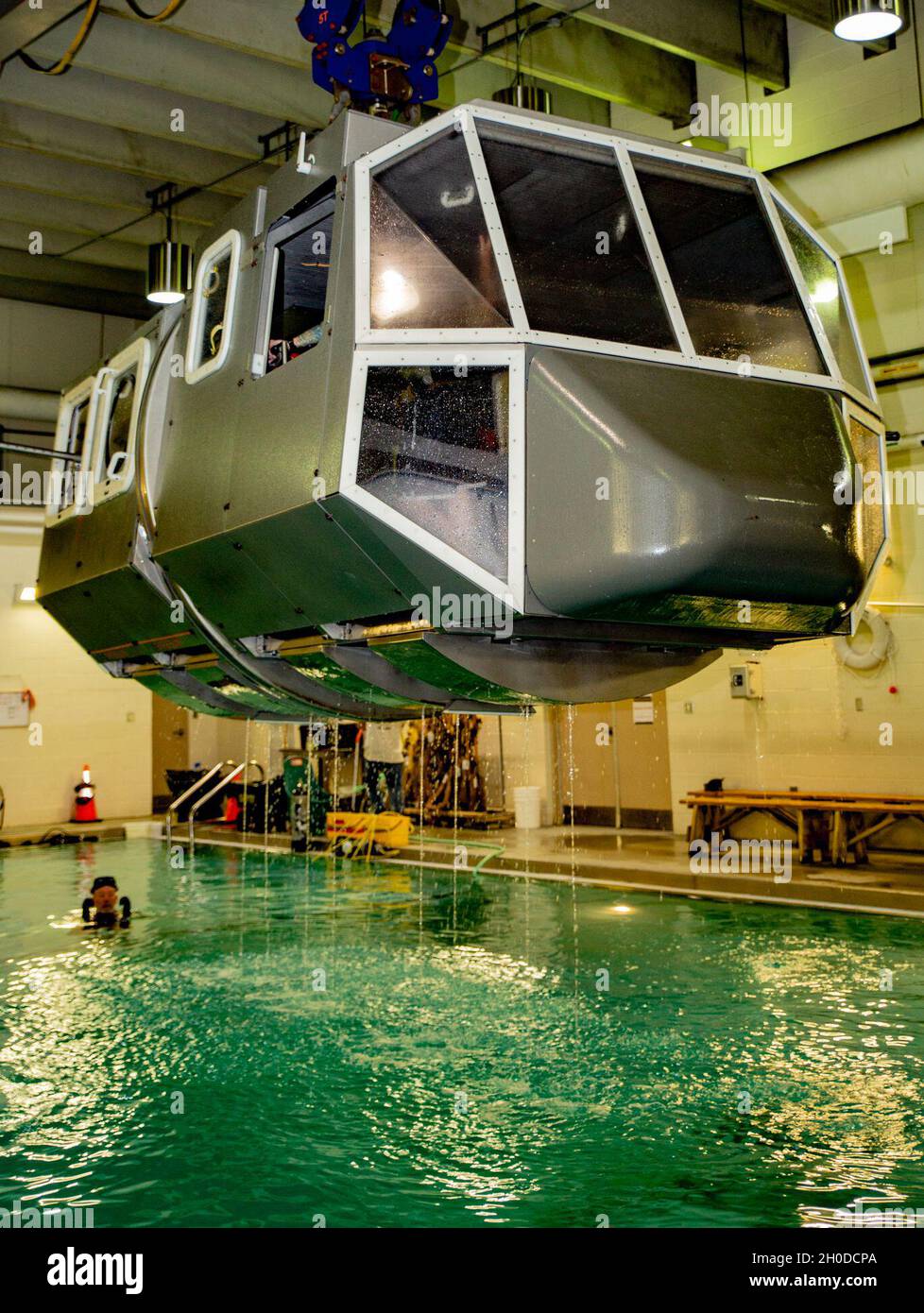 U.S. Marines prepare to escape the Modular Amphibious Egress Trainer ...