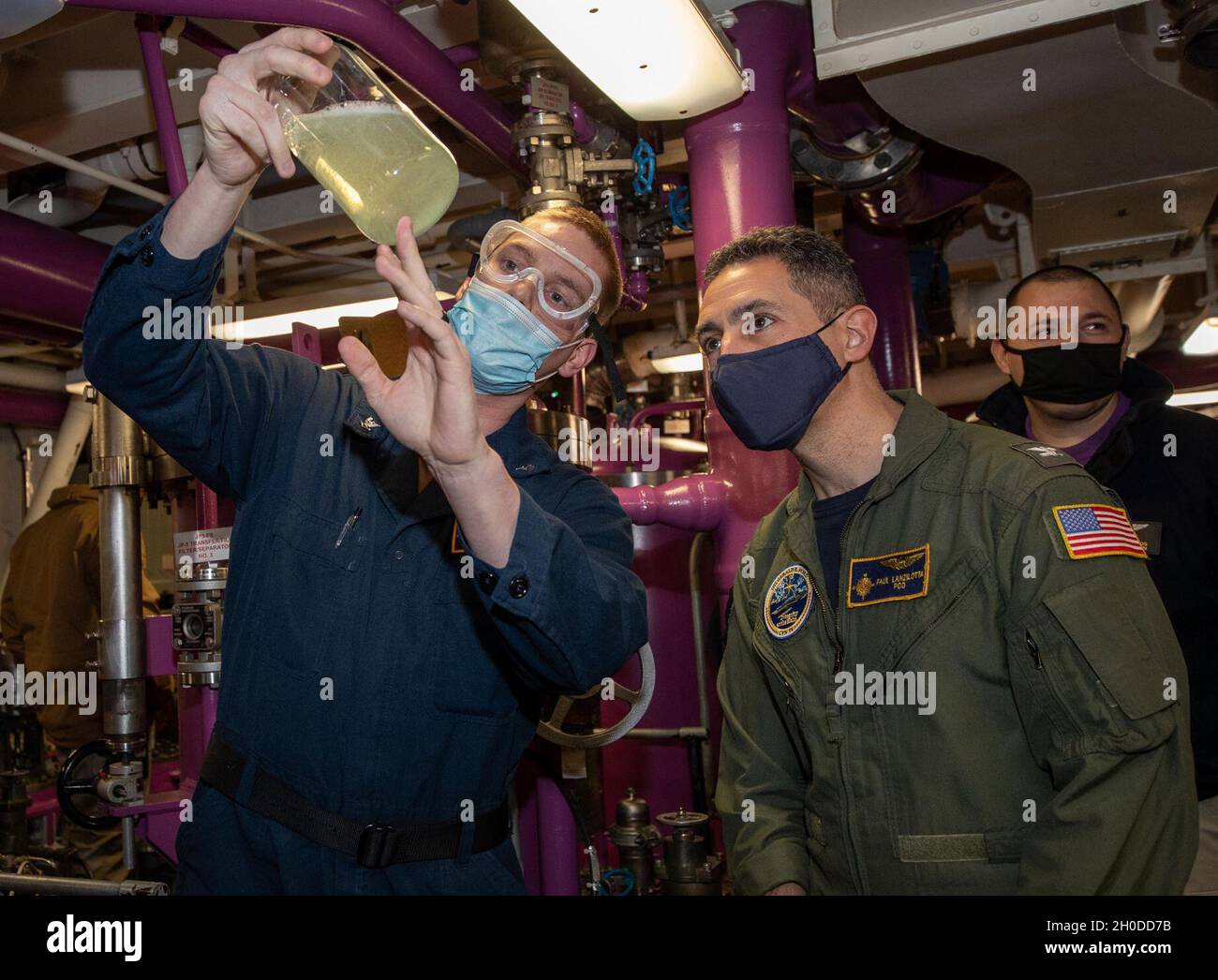 Aviation Boatswain's Mate (Fuels) 3rd Class Jacob Clauss, left, from ...