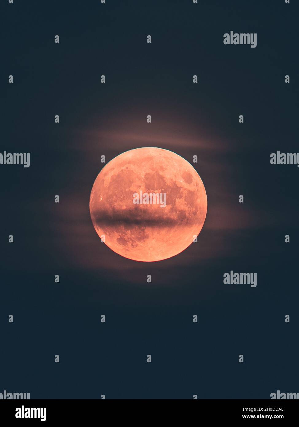 Eerie scenery of the red full moon on a night sky Stock Photo - Alamy
