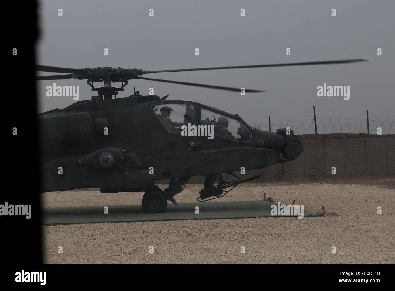 An AH-64 Apache helicopter, operated by Soldiers with 4-4th Attack ...