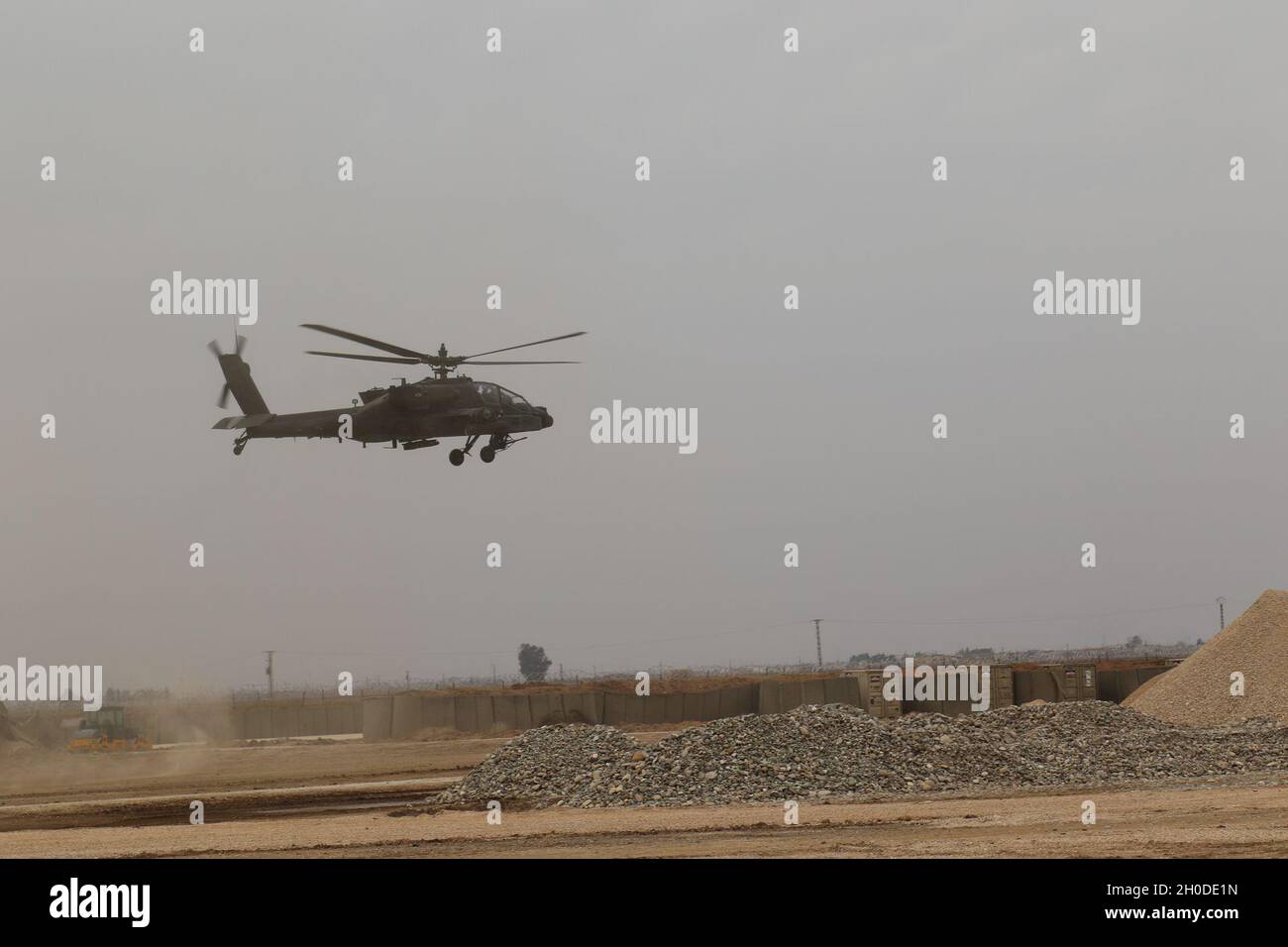 An AH-64 Apache helicopter, operated by Soldiers with 4-4th Attack ...