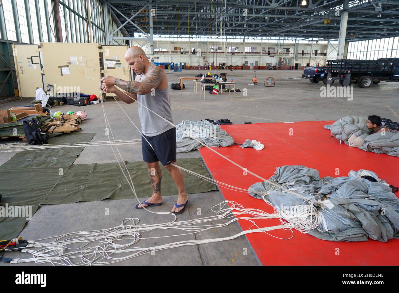 Tech. Sgt. Edward Peguero, an aircrew flight equipment technician with ...