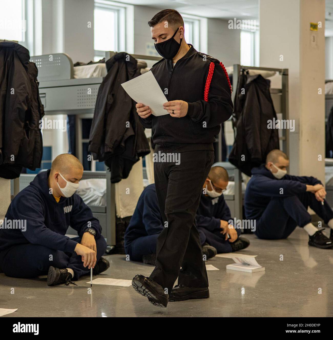 Yeoman 1st Class Kerry Grove Jr. instructs recruits as they do ...