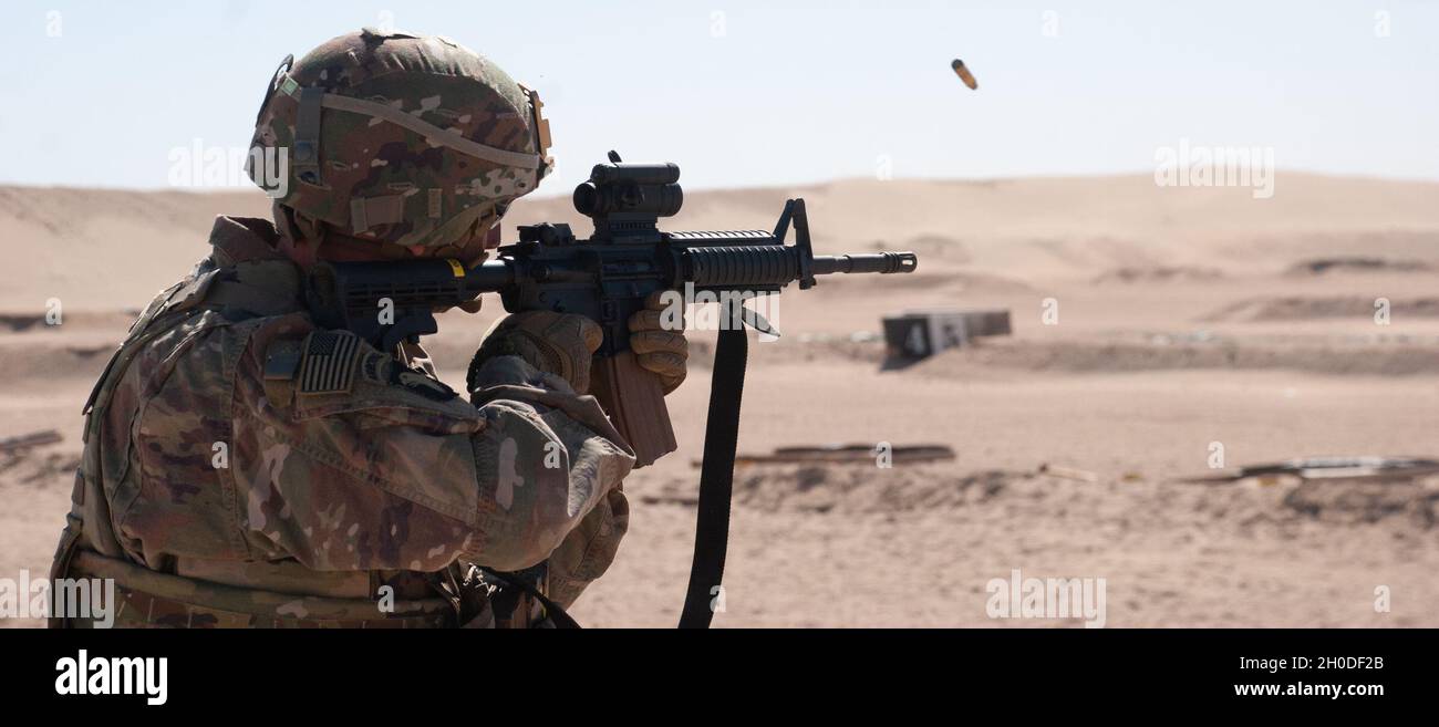 U.S. Soldiers with the 28th Expeditionary Combat Aviation Brigade fire ...