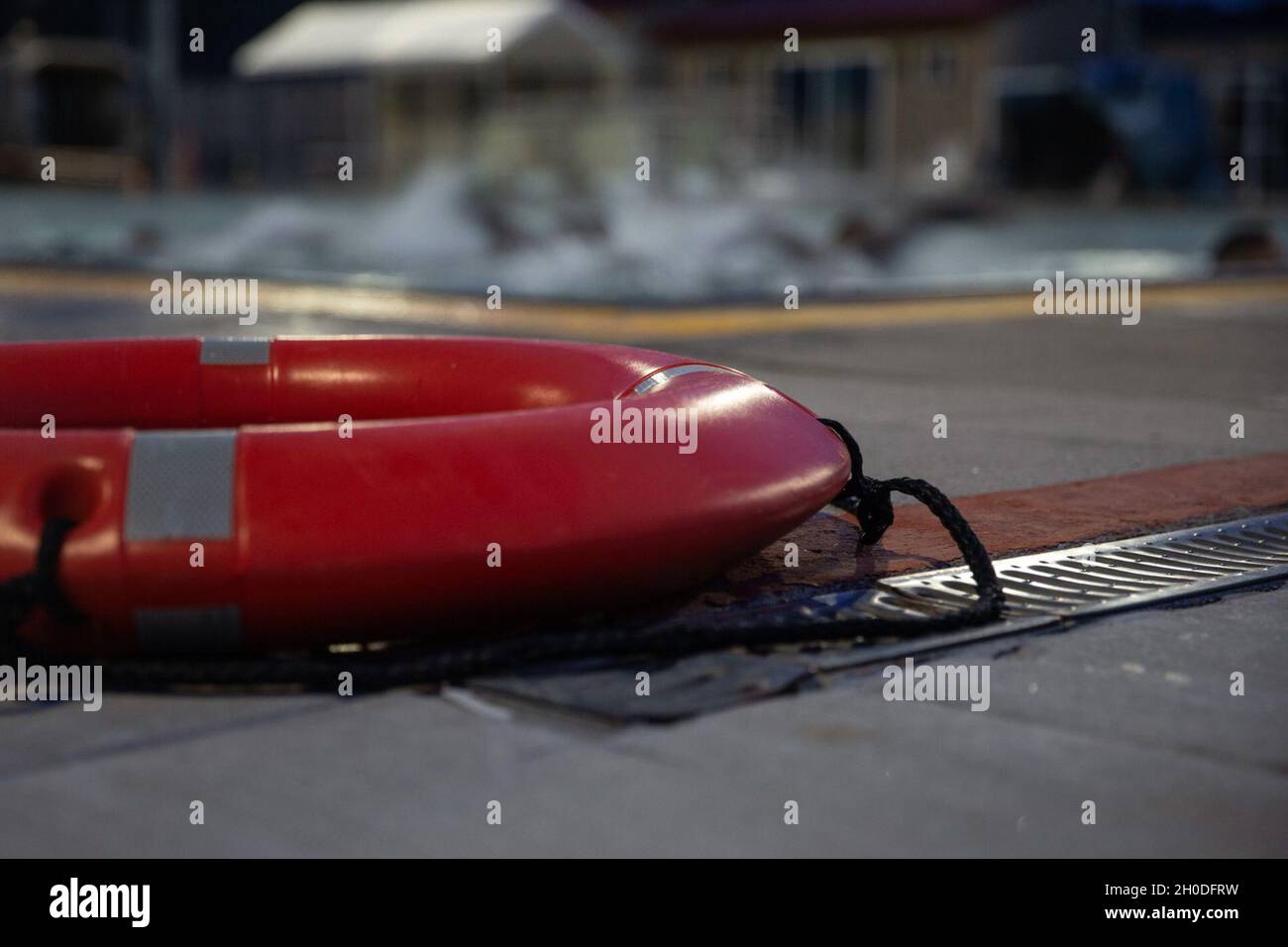 A life preserver waits on the pool deck while U.S. Marines with Alpha ...