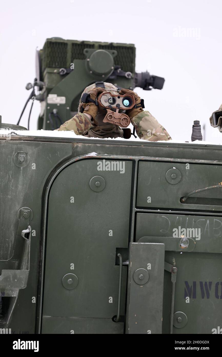 U.S. Soldier from 1st Squadron, 2d Cavalry Regiment spots targets ...