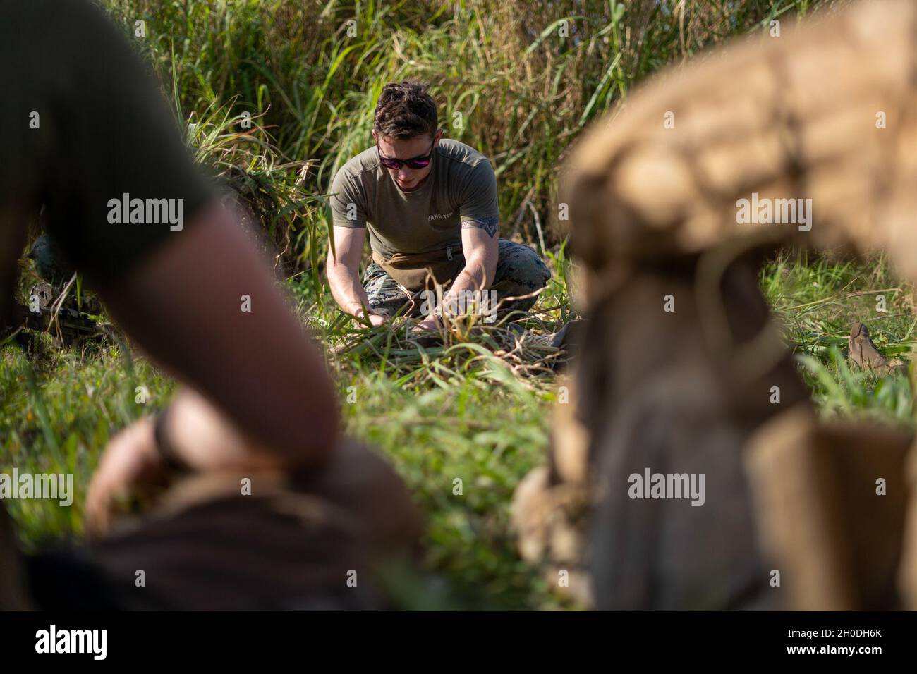 U.S. Marine Corps Cpl. James Pipes, a scout sniper with 3d Battalion ...