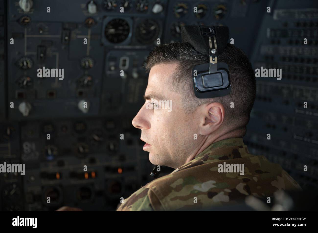 A U.S. Air Force, KC-10 flight engineer monitors fuel levels during ...
