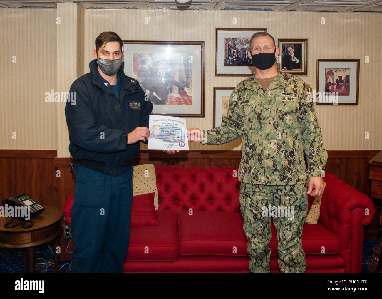 U.S. Navy Capt. Cassidy Norman, right, commanding officer of the ...