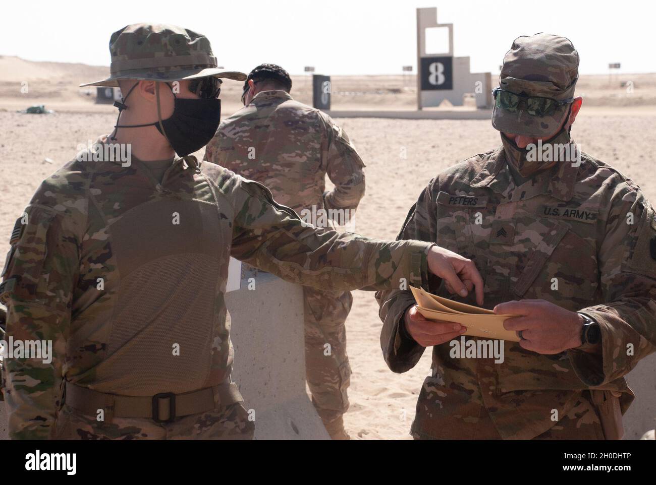 U.S. Soldiers with the 28th Expeditionary Combat Aviation Brigade fire ...