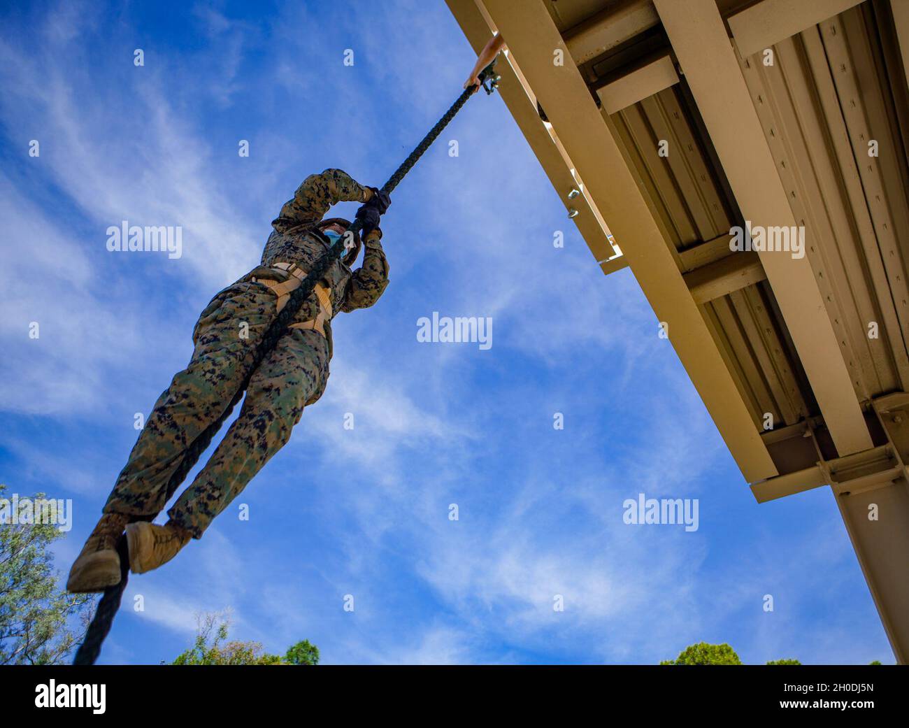 A U.S. Marine with 1st Radio Battalion, I Marine Expeditionary Force ...