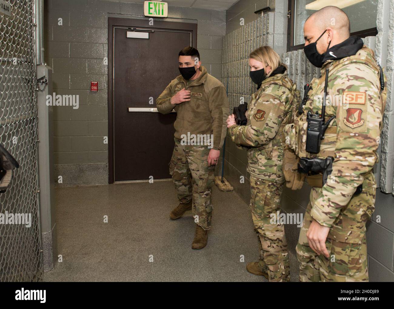 U.S. Air Force Tech. Sgt. Nelson Acosta, left, the 673d Security Forces Squadron military ...